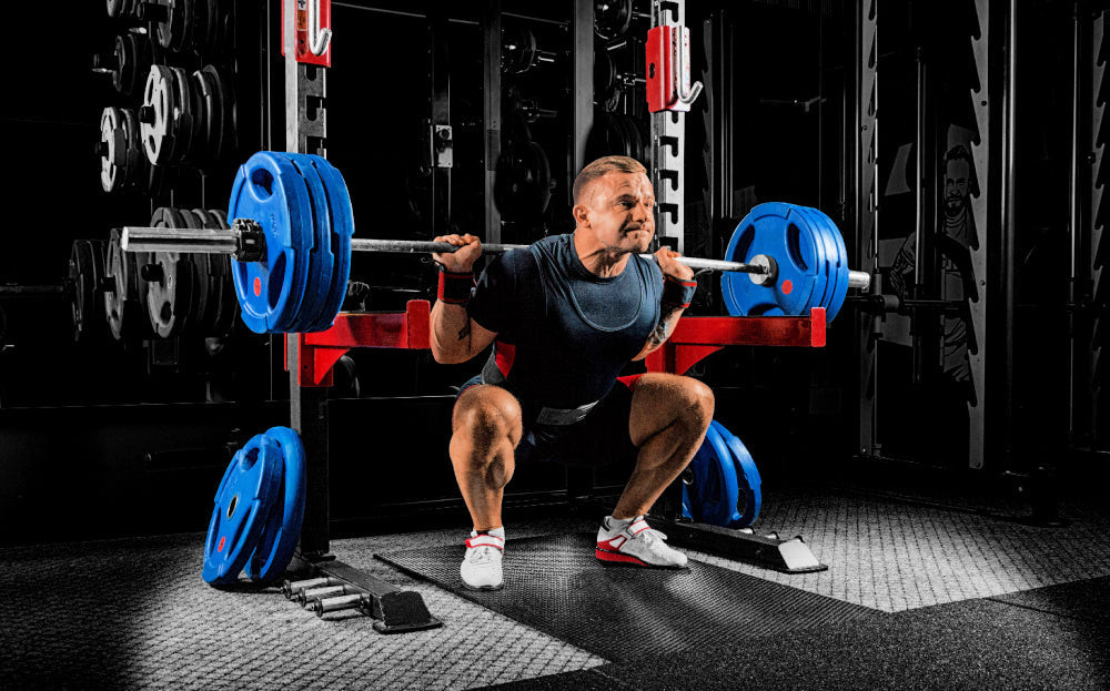 How to Do Kang Squats Properly (Form & Muscles Worked) - Steel Supplements